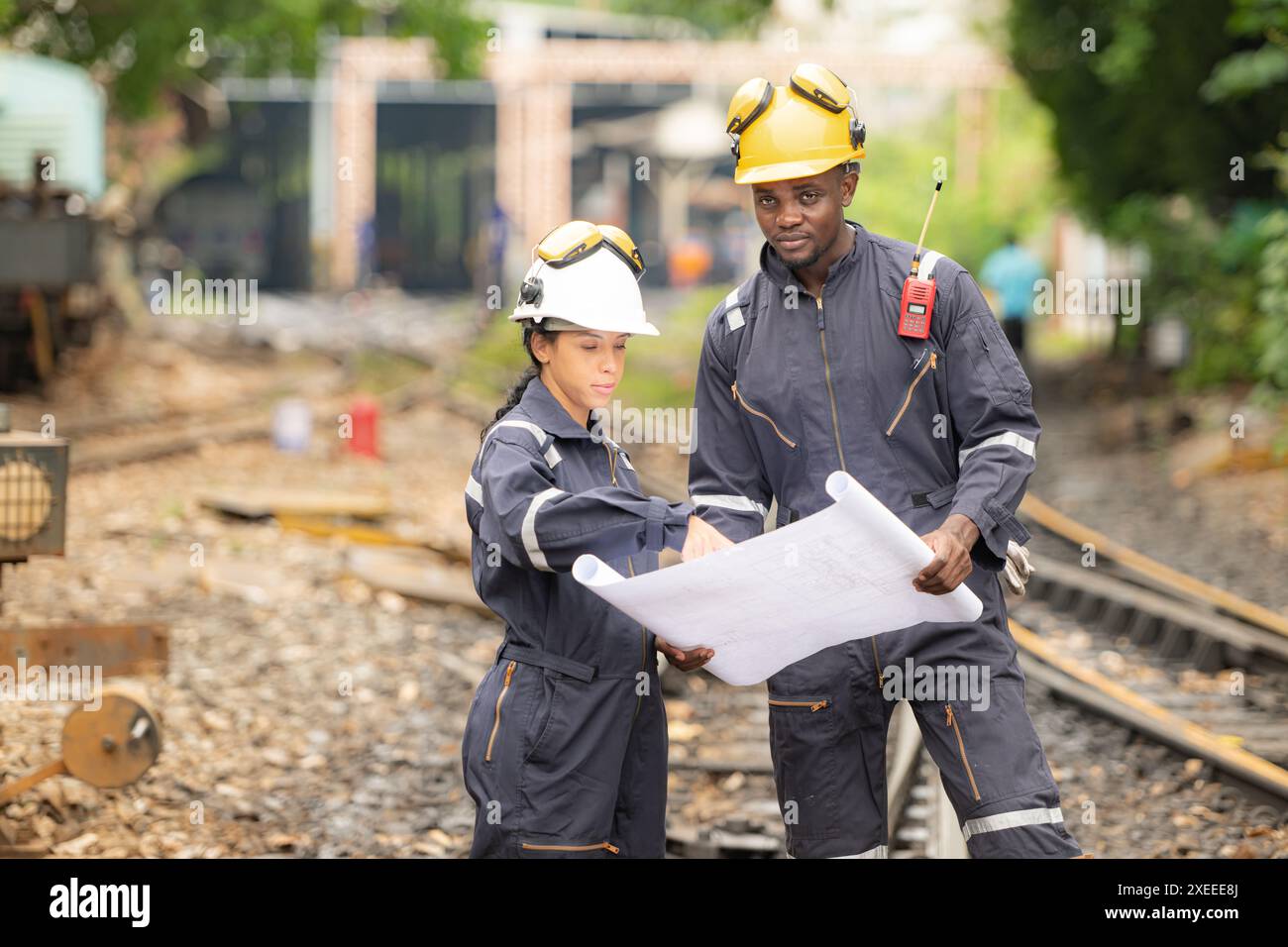 Railway technicians and engineers, Working on the train tracks at train ...
