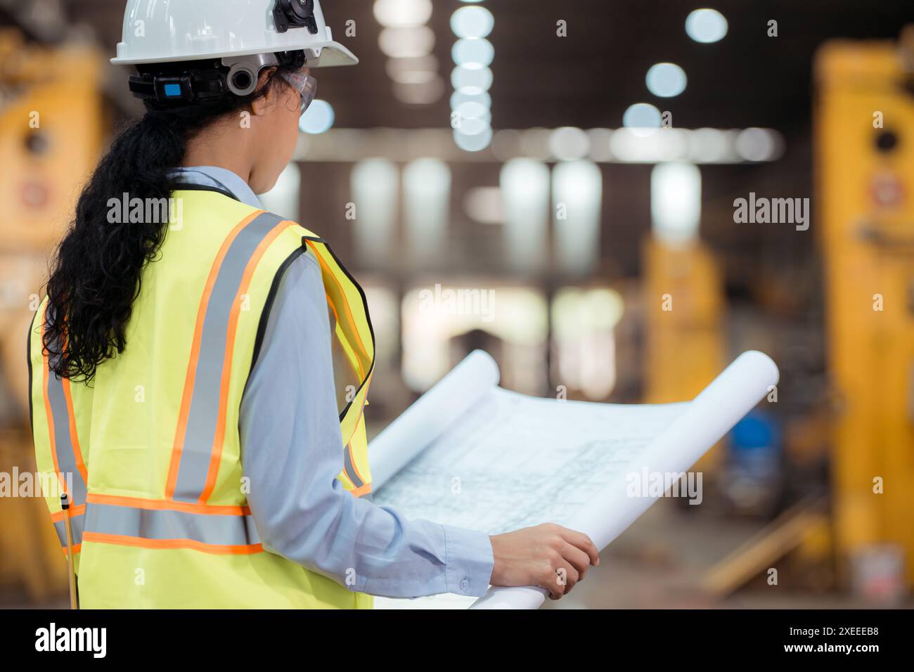 Portrait of railway technician worker in safety vest and helmet working ...