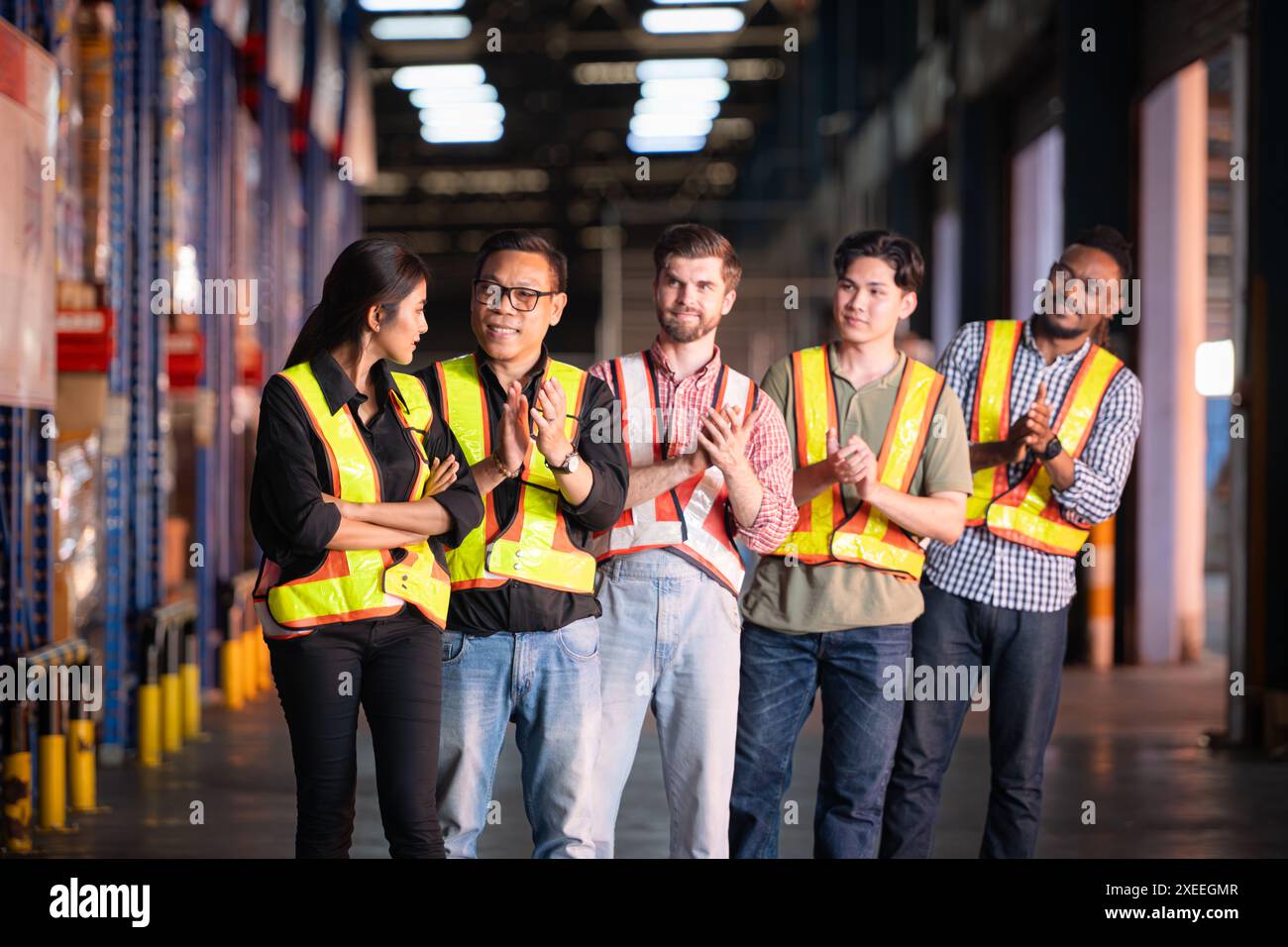 Portrait of group employees in the warehouse with arms crossed Stock ...