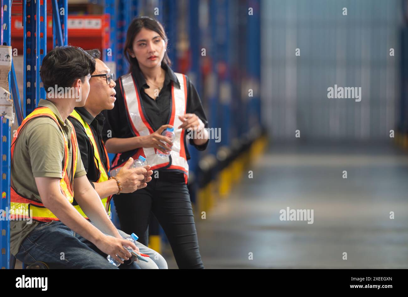 Group of warehouse employee rest comfortably during work Stock Photo ...