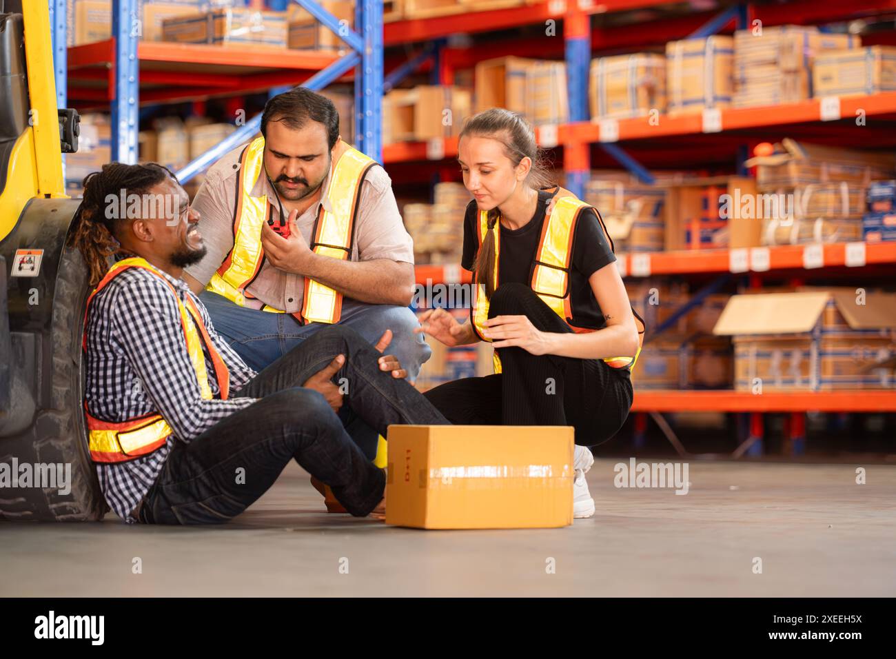 A warehouse employee suffered a leg accident at work Stock Photo - Alamy