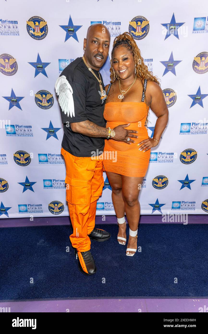 Comedian and Actress Torrei Hart with manager Damega attends 2024 Angel ...