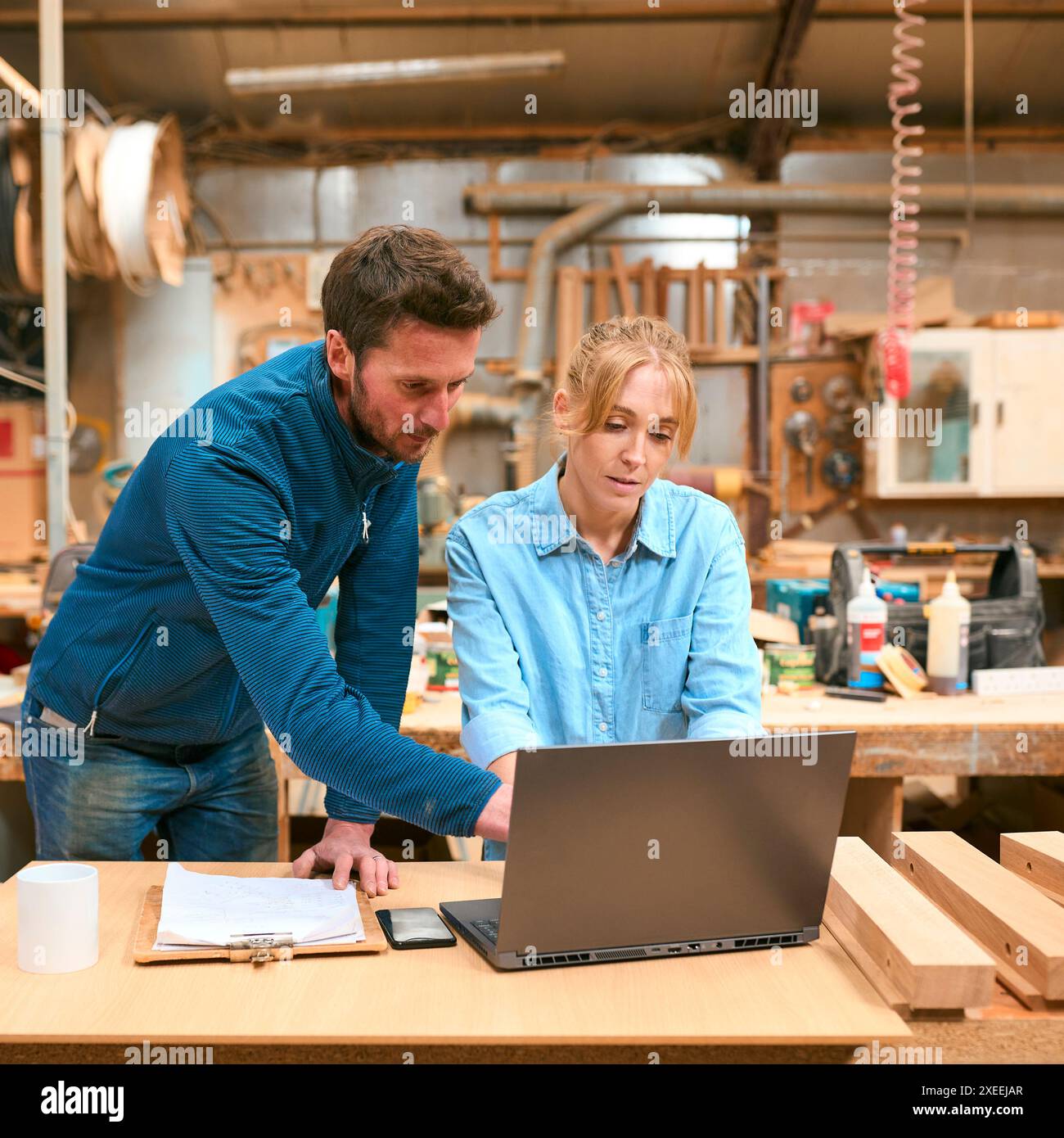 Two men working wood machinery hi-res stock photography and images - Alamy