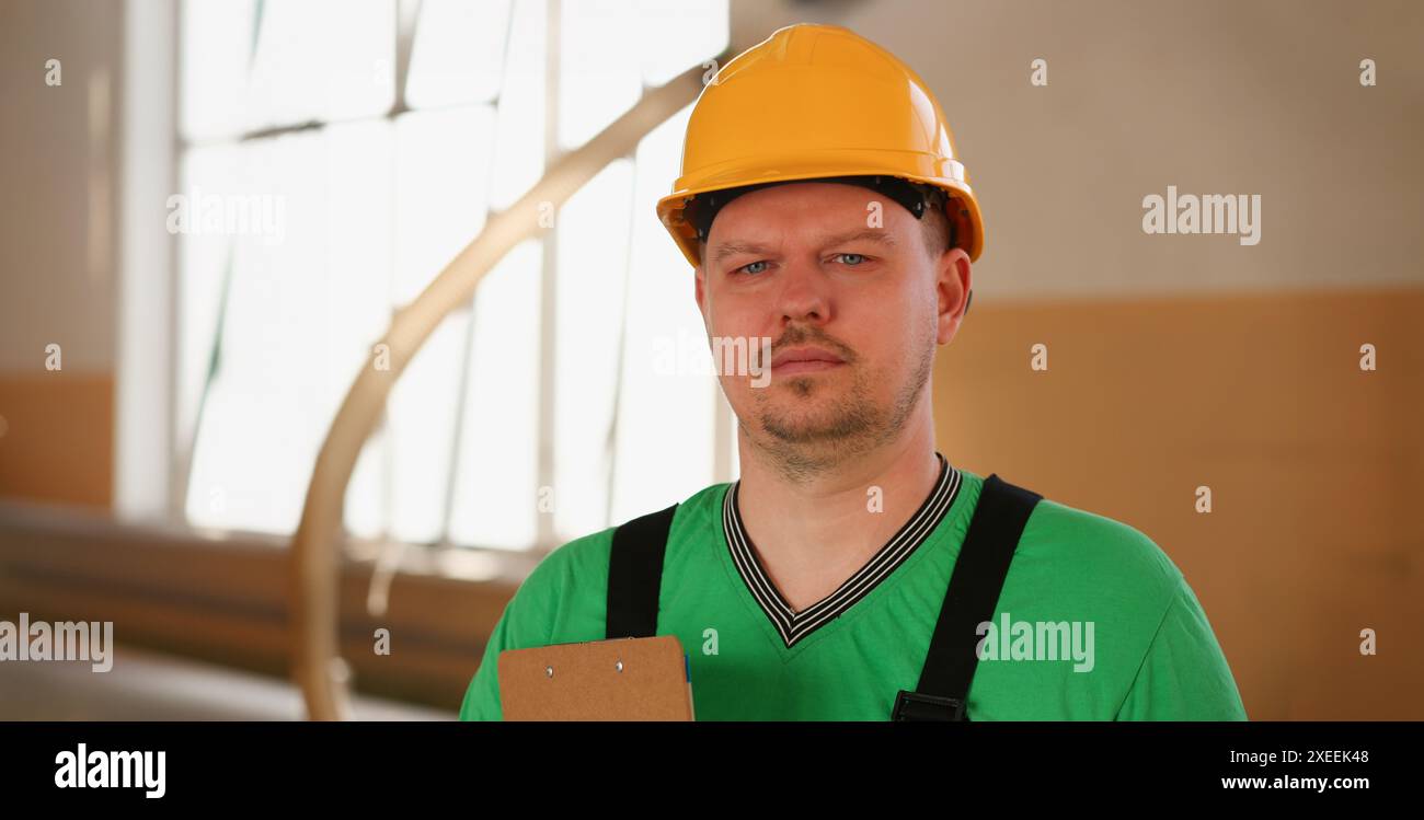 Portrait of young attractive man in work Stock Photo - Alamy