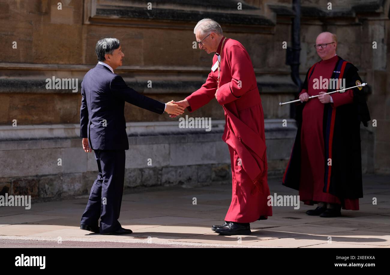 Emperor Naruhito of Japan (left) is greeted by Reverend Dr Christopher ...