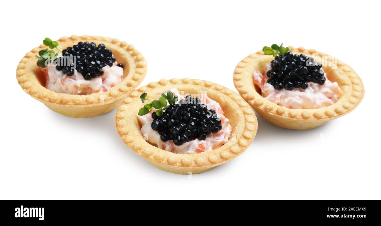 Delicious canapes with black caviar isolated on white Stock Photo - Alamy