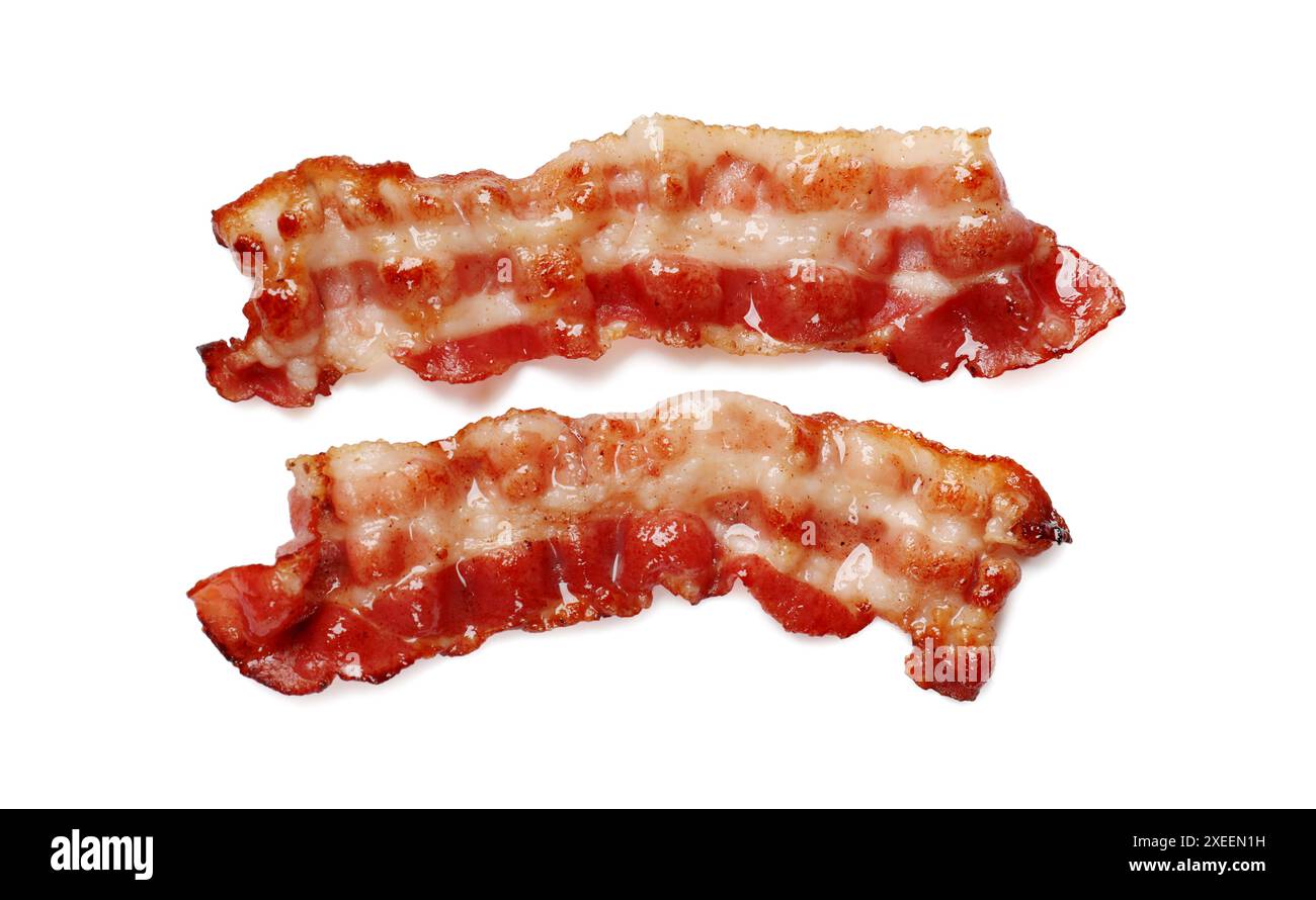 Slices of tasty fried bacon isolated on white, top view Stock Photo - Alamy