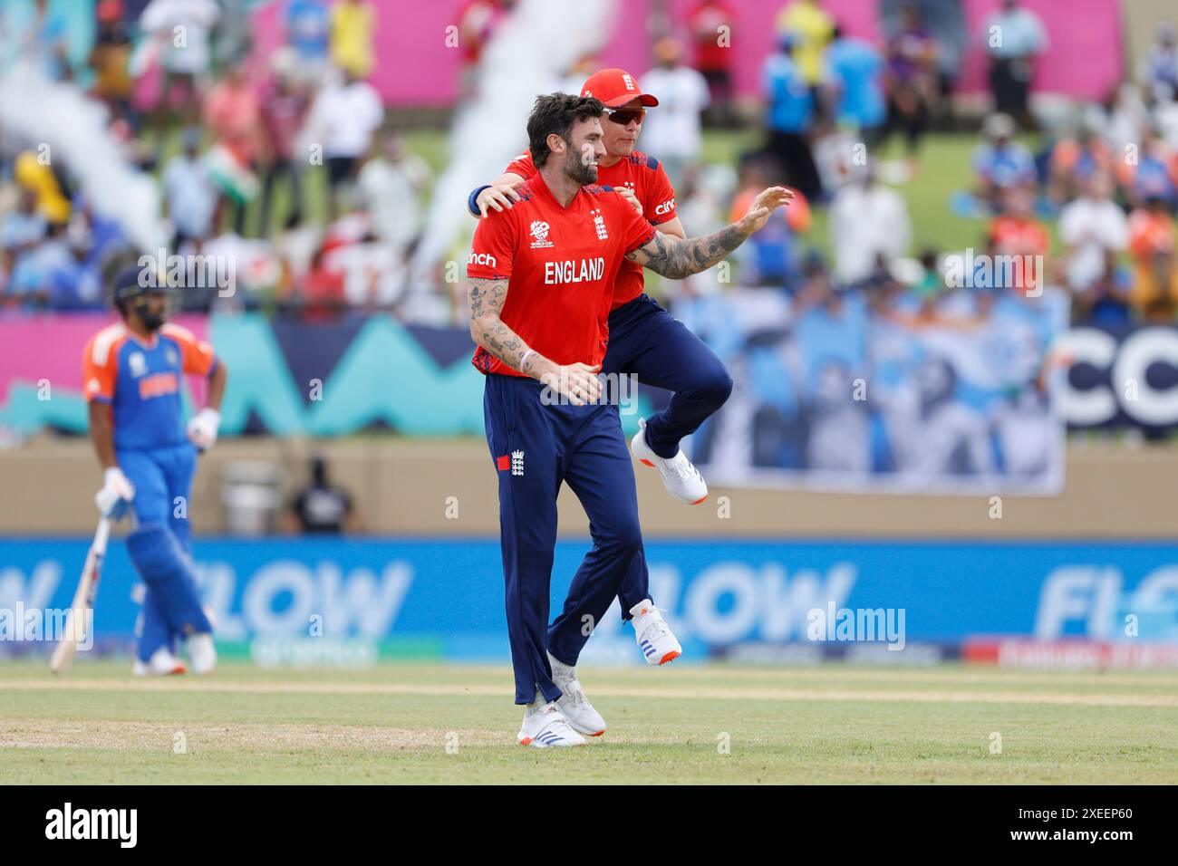 England's Reece Topley (left) celebrates with Sam Curran after taking ...
