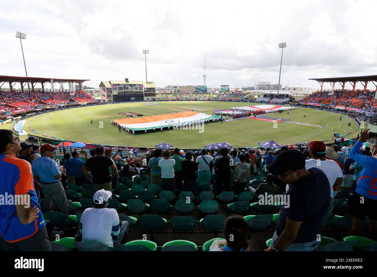 India and England players stand for the national anthems before the ...