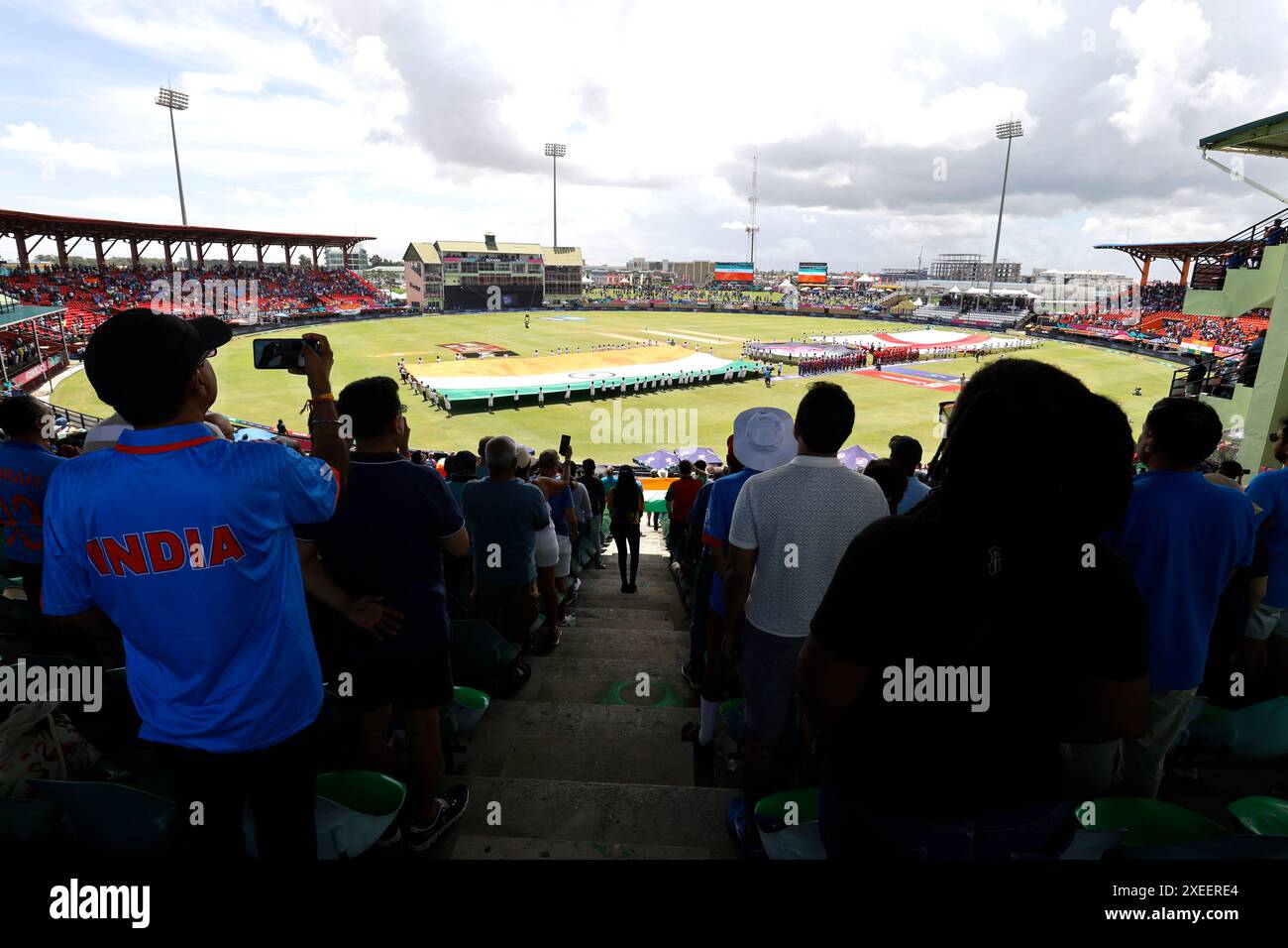 India and England players stand for the national anthems before the ...