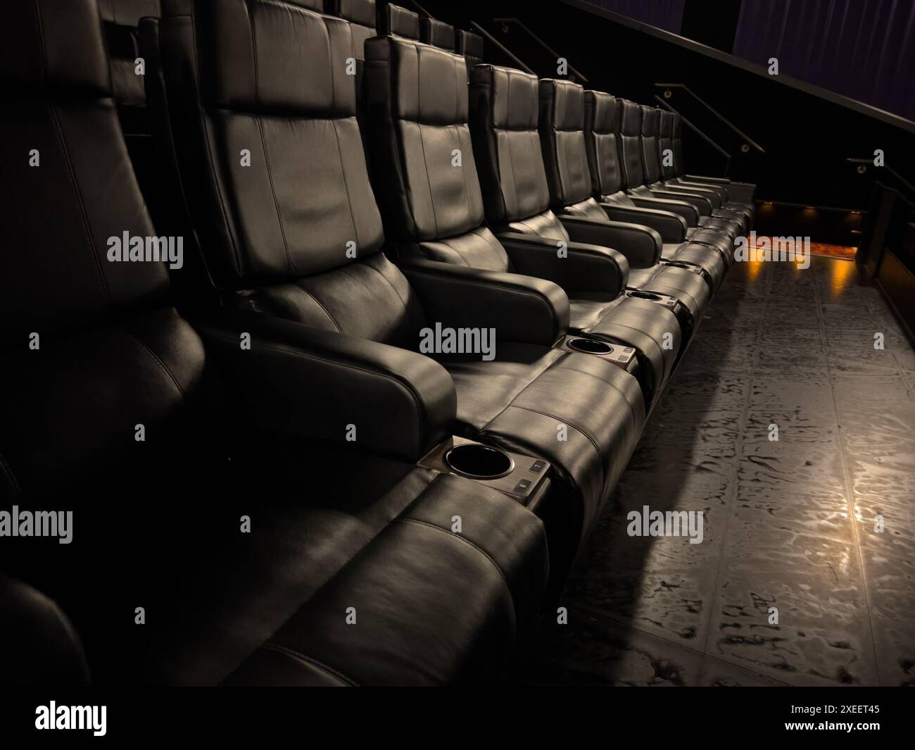 Empty Reclining Leather Seats in a Modern Movie Theater Stock Photo - Alamy