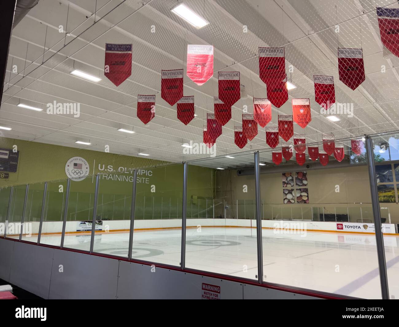 Ice Rink at U.S. Olympic Training Site with Hanging Red Banners Stock ...