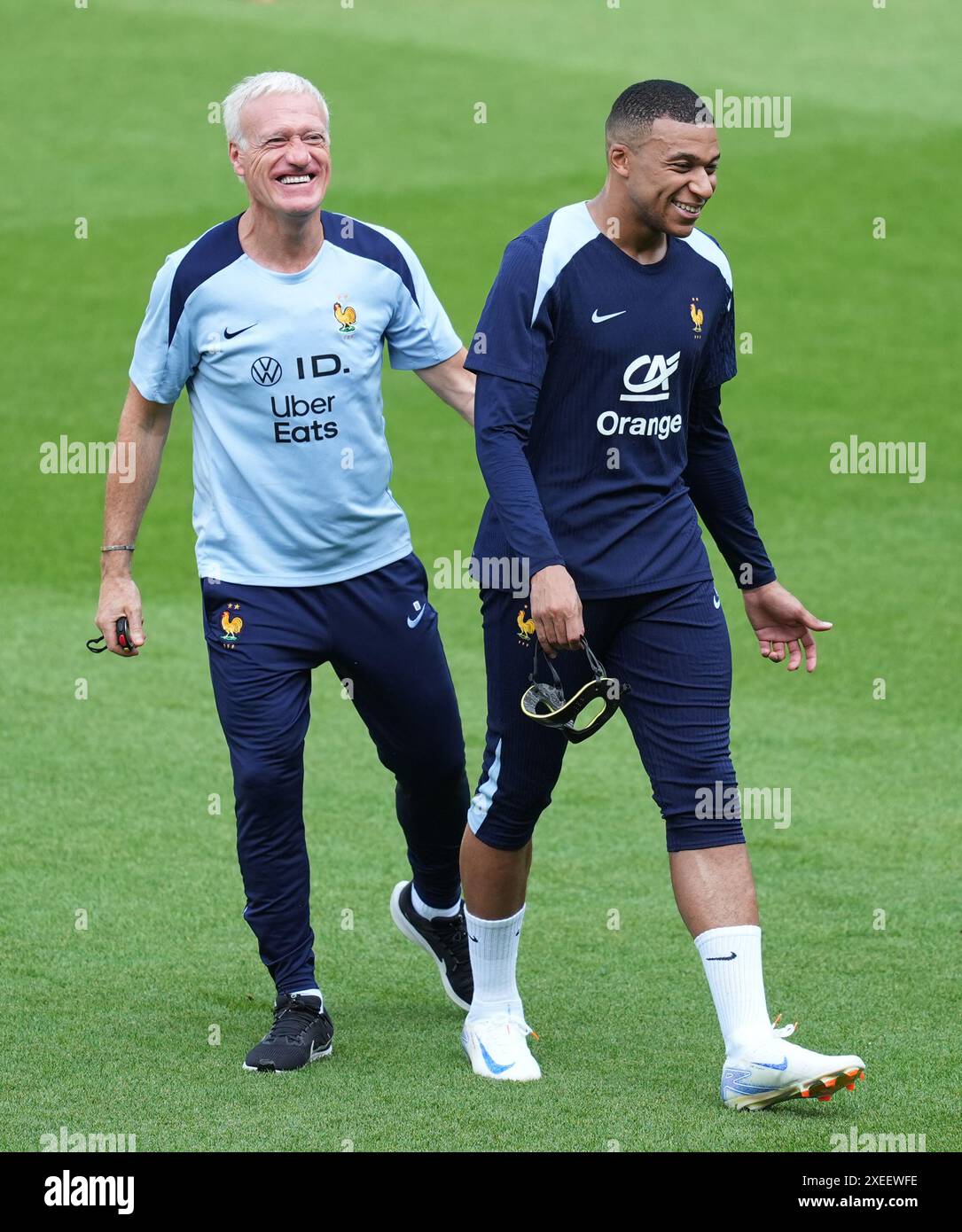 France's Kylian Mbappe with manager Didier Deschamps during a training ...