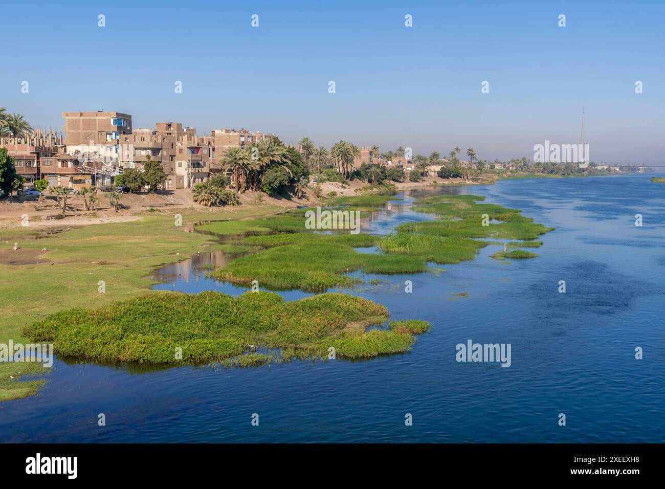 The Nile river coastline in Qena, Middle Egypt, with the poor ...