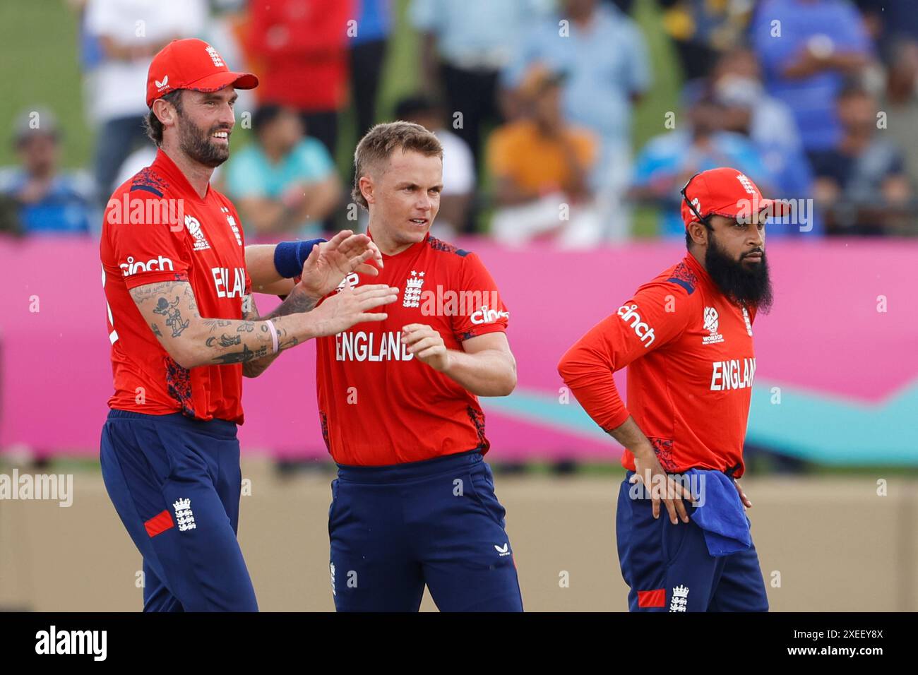 England's Sam Curran celebrates after taking the wicket of India's ...