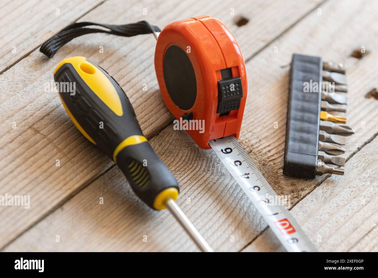 Measuring Tape Tool and screwdriver bits set Stock Photo - Alamy