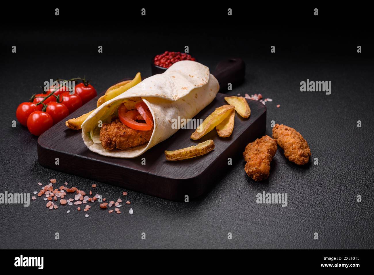 Delicious roll with chicken nuggets Stock Photo - Alamy