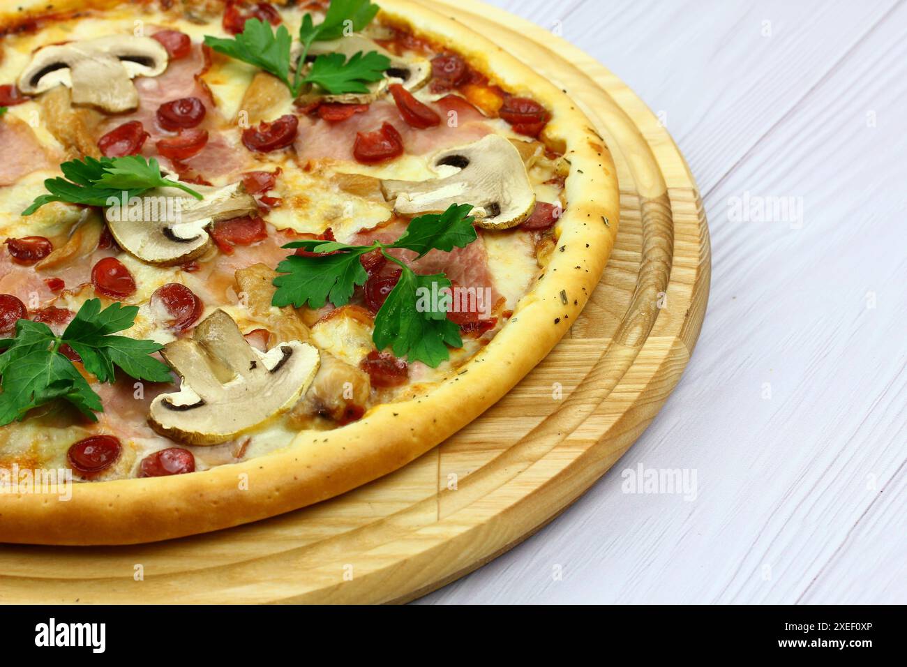 Supreme Pizza with pepperoni, mushrooms and mozzarella cheese just from ...
