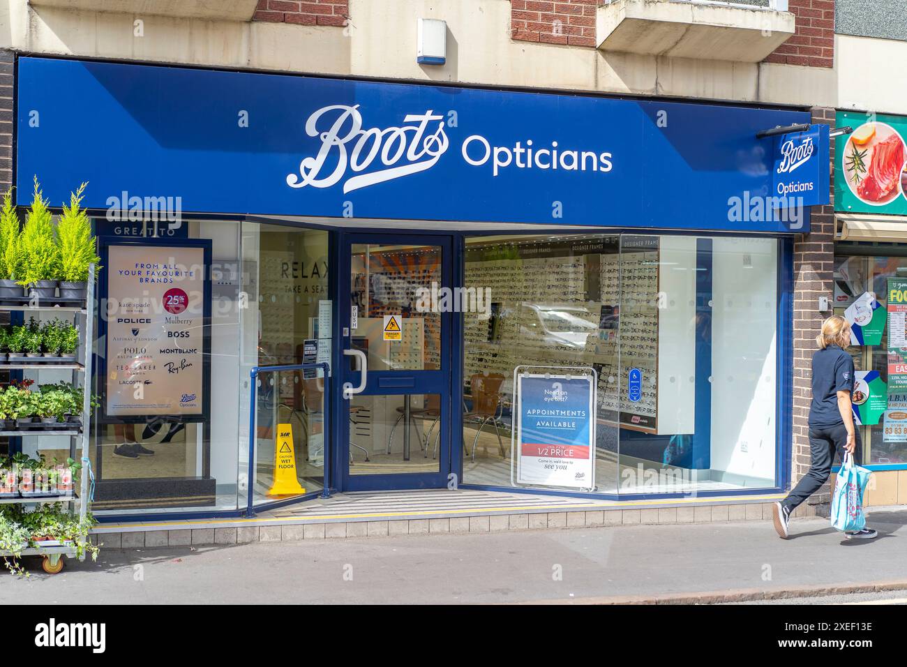 Front entrance view of a Boots Opticians shop on a UK high street Stock ...