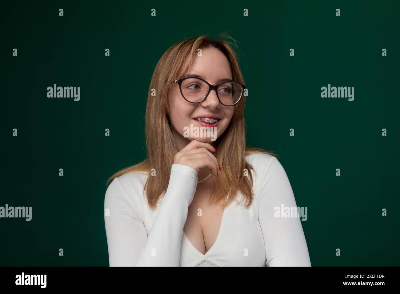 Modern pose with glasses hi-res stock photography and images - Alamy