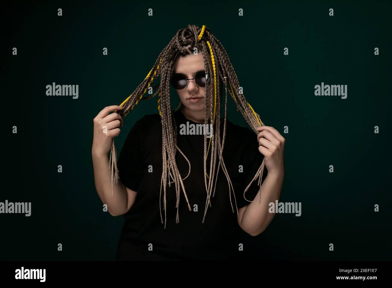 Man With Dreadlocks Holding Hair in Front of His Face Stock Photo - Alamy
