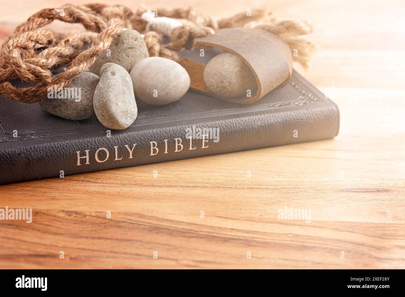 Sling Shot and Stones on a Wooden Table from the Story of David and ...