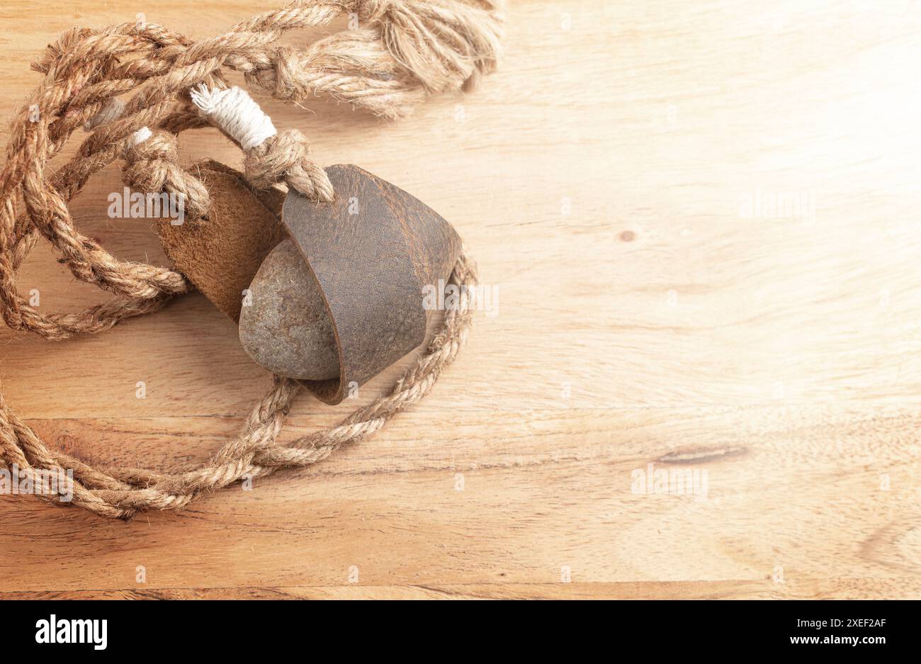 Sling Shot and Stones on a Wooden Table from the Story of David and ...