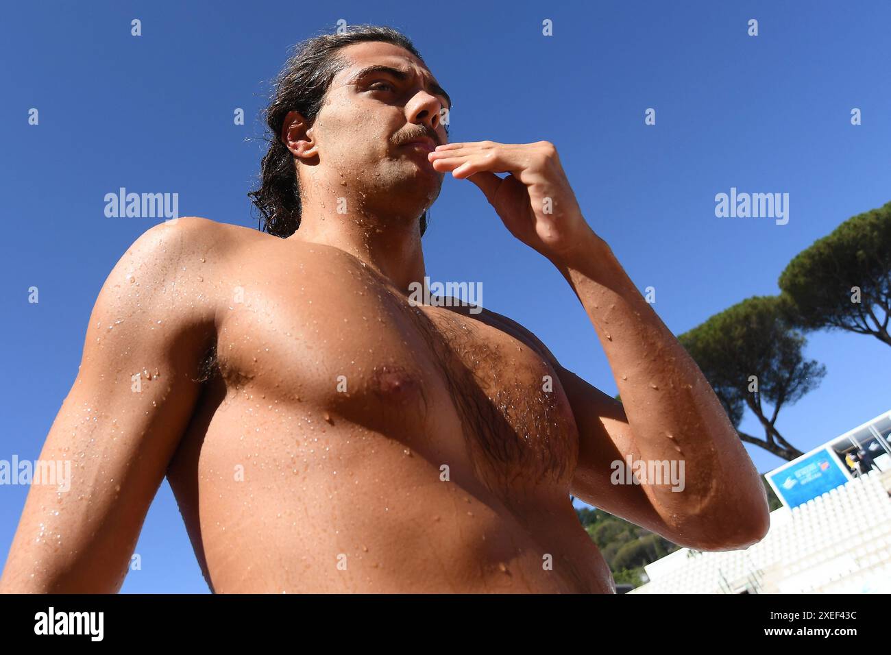 Thomas Ceccon of Italy reacts after competing in the 50m Backstroke Men ...
