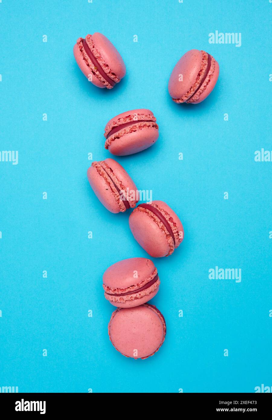 Macarons on blue background hi-res stock photography and images - Alamy
