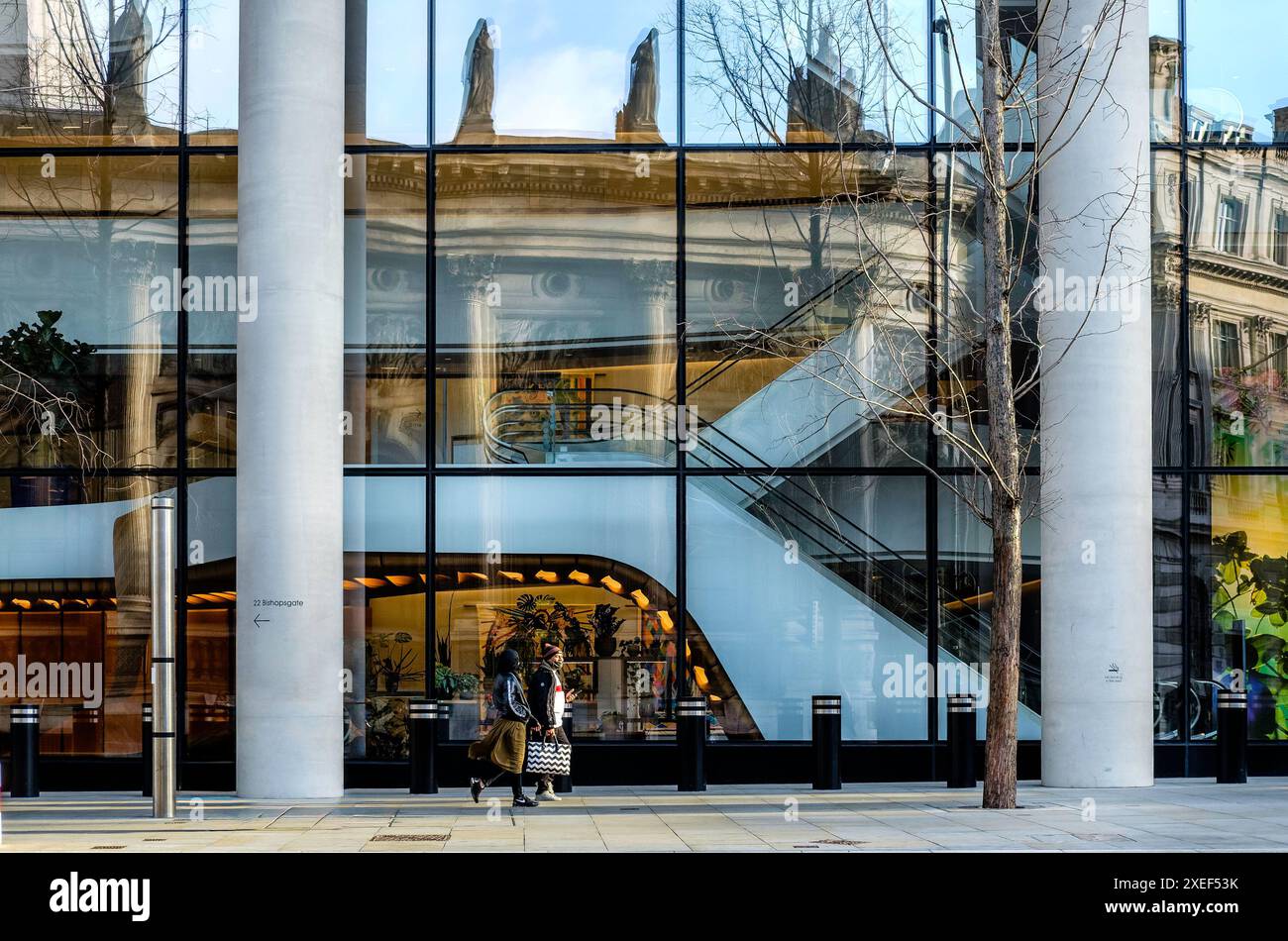 The 19th century Gibson Hall building reflected in the modern facade of ...