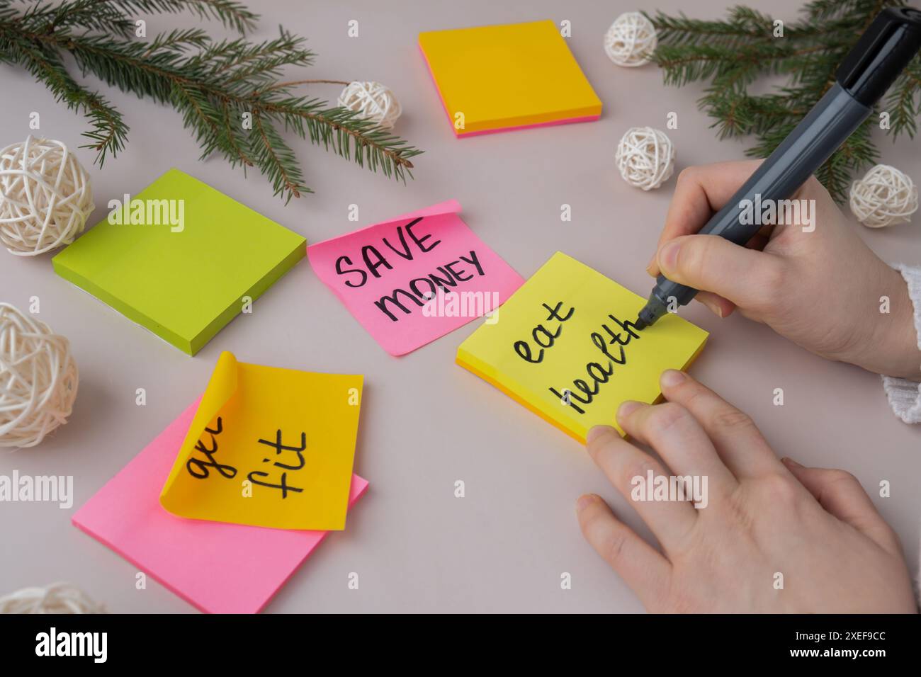 Woman writing promises and aims. Preparation for new year new life new ...