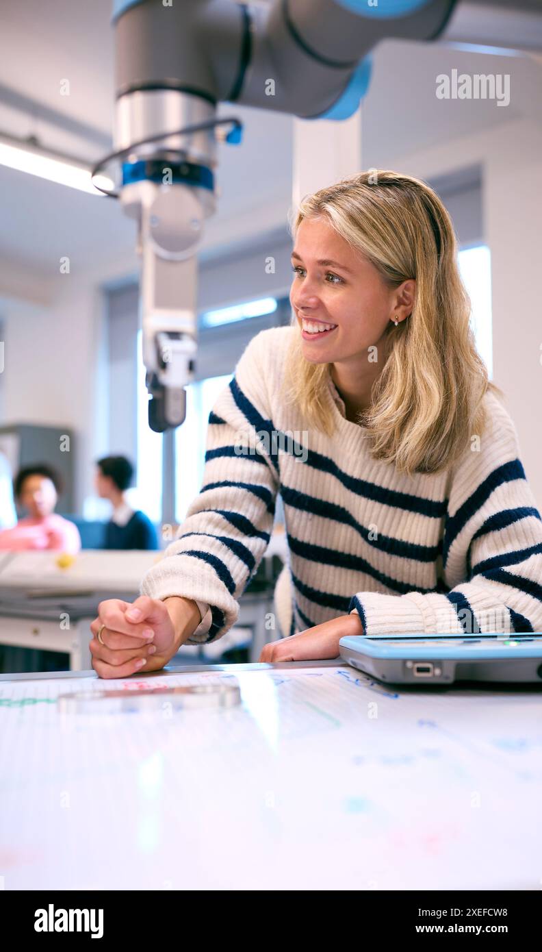 Female College Or University Engineering Student In Robotics Class ...