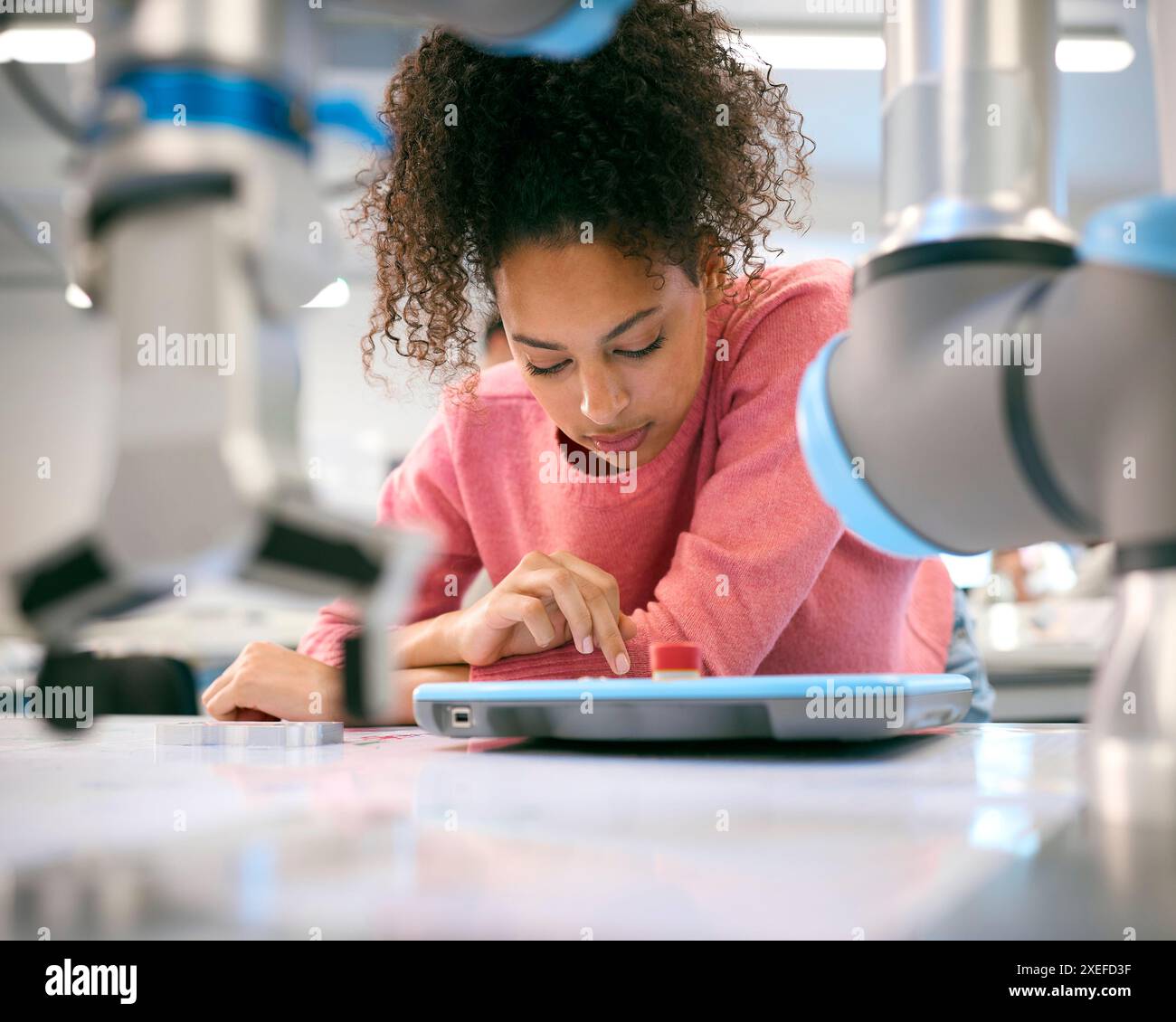 Female student in electronics hi-res stock photography and images - Alamy