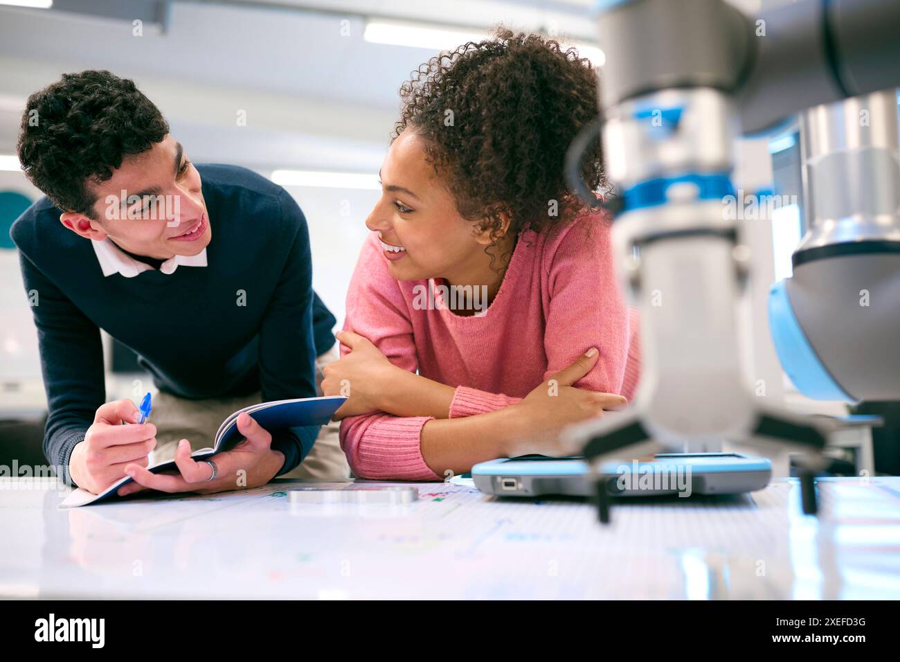 Male And Female College Or University Engineering Students In Robotics ...