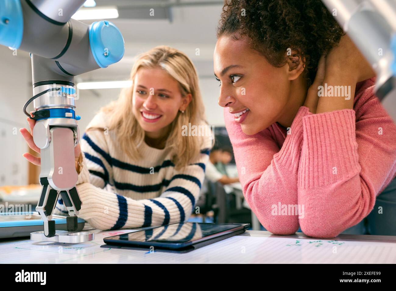 Two Female College Or University Engineering Students Using Digital ...