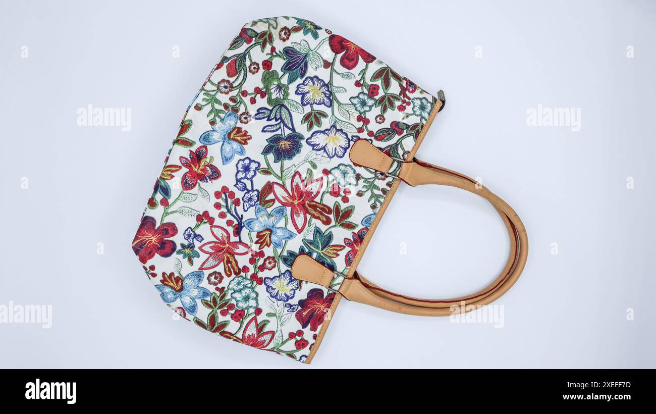 Beautiful Handbag with floral design patterns on white background Stock ...