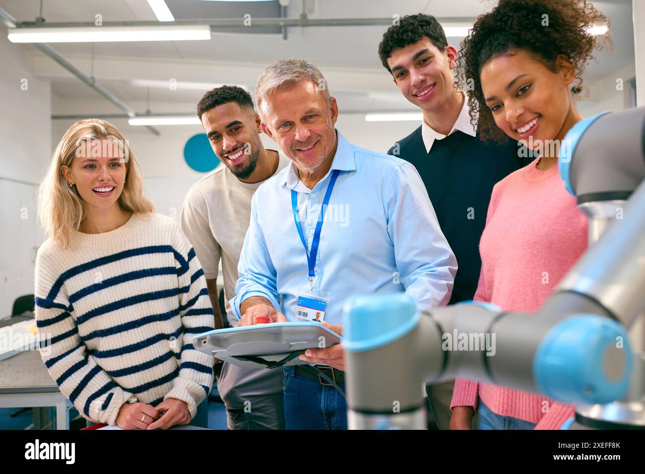 Group Of College Or University Engineering Students In Robotics Class ...