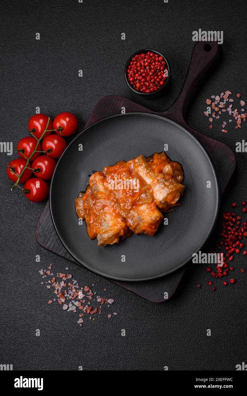 Delicious fresh sea fish cut into pieces and baked in tomato sauce ...