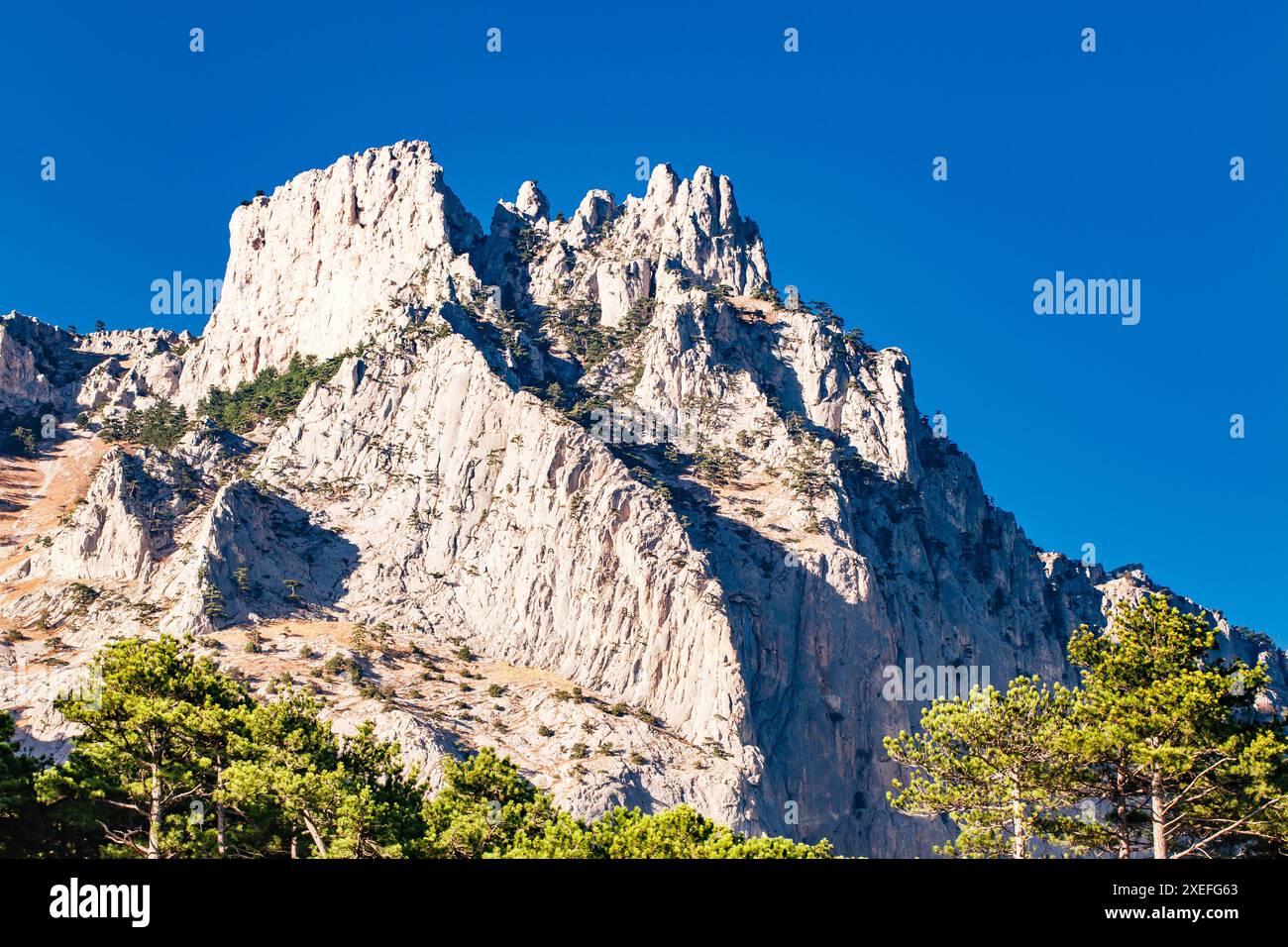 Sheer cliff in mountains hi-res stock photography and images - Alamy