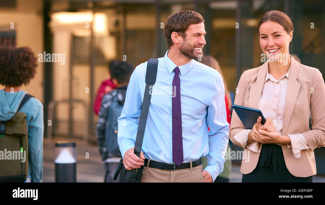 Male And Female Secondary Or High School Teachers Outside School ...