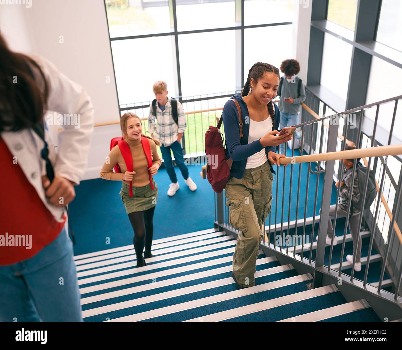 Female Secondary Or High School Pupil With Mobile Phone In School ...