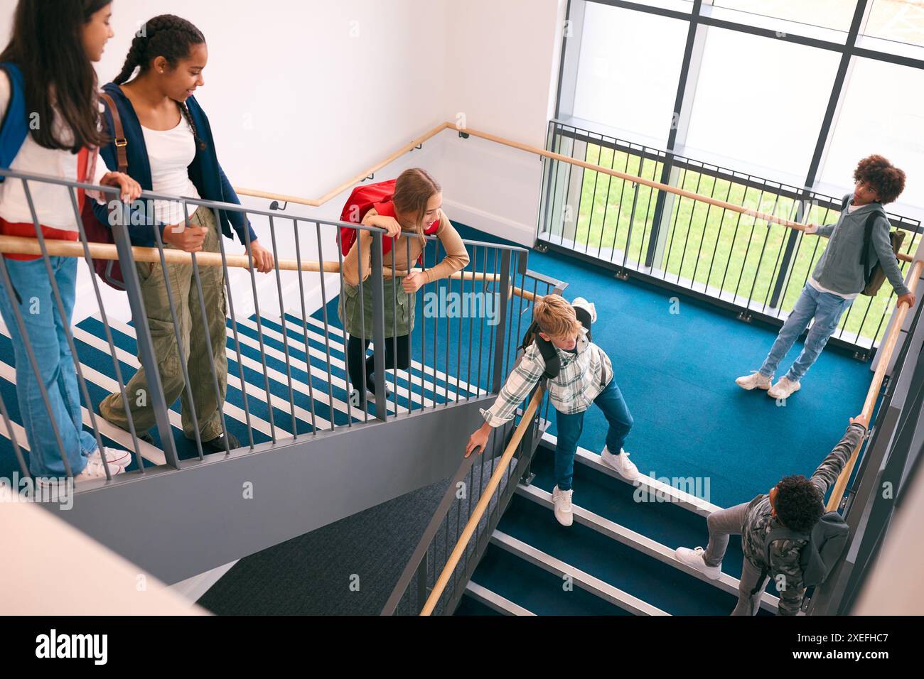 Group Of Secondary Or High School Pupils Inside School Building On ...