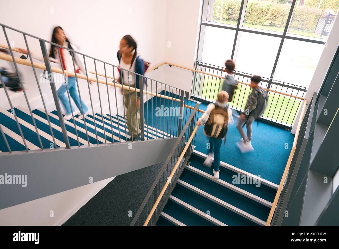 Group Of Secondary Or High School Pupils Inside School Building On ...