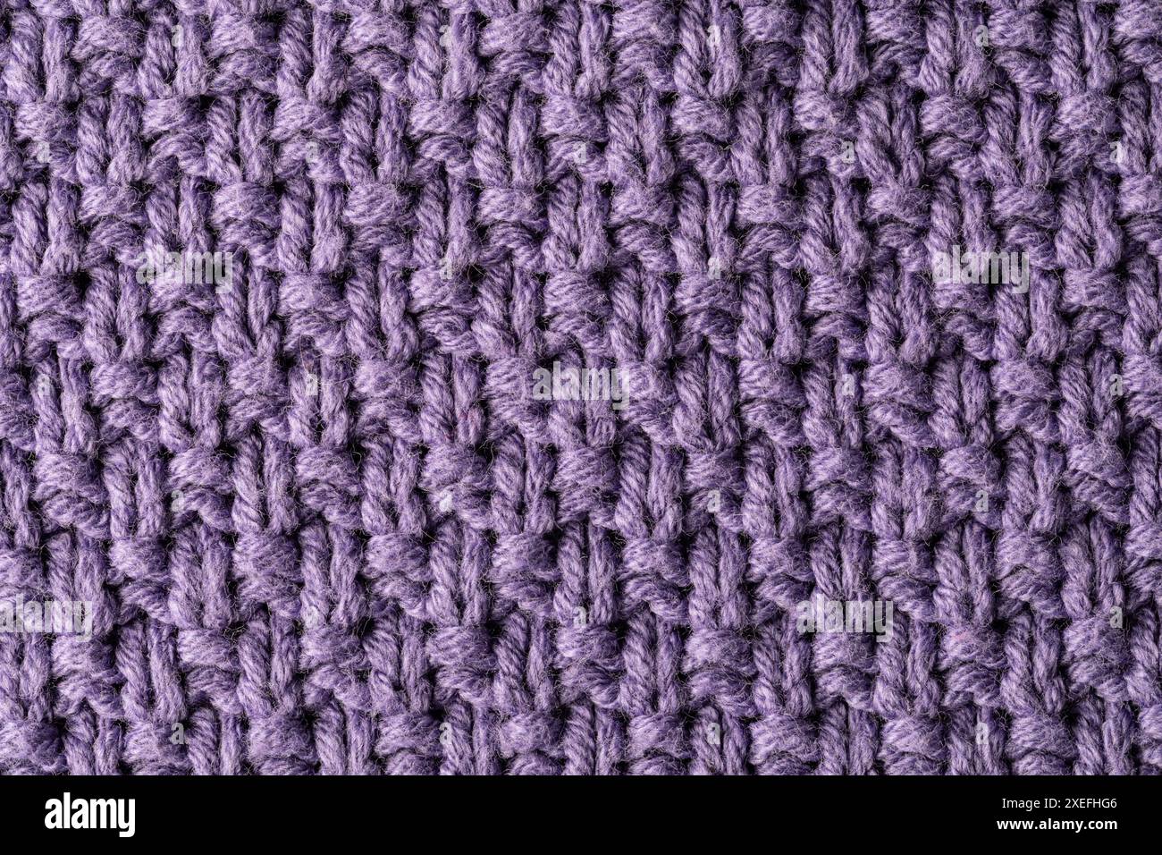 Knitted fabric texture Stock Photo - Alamy