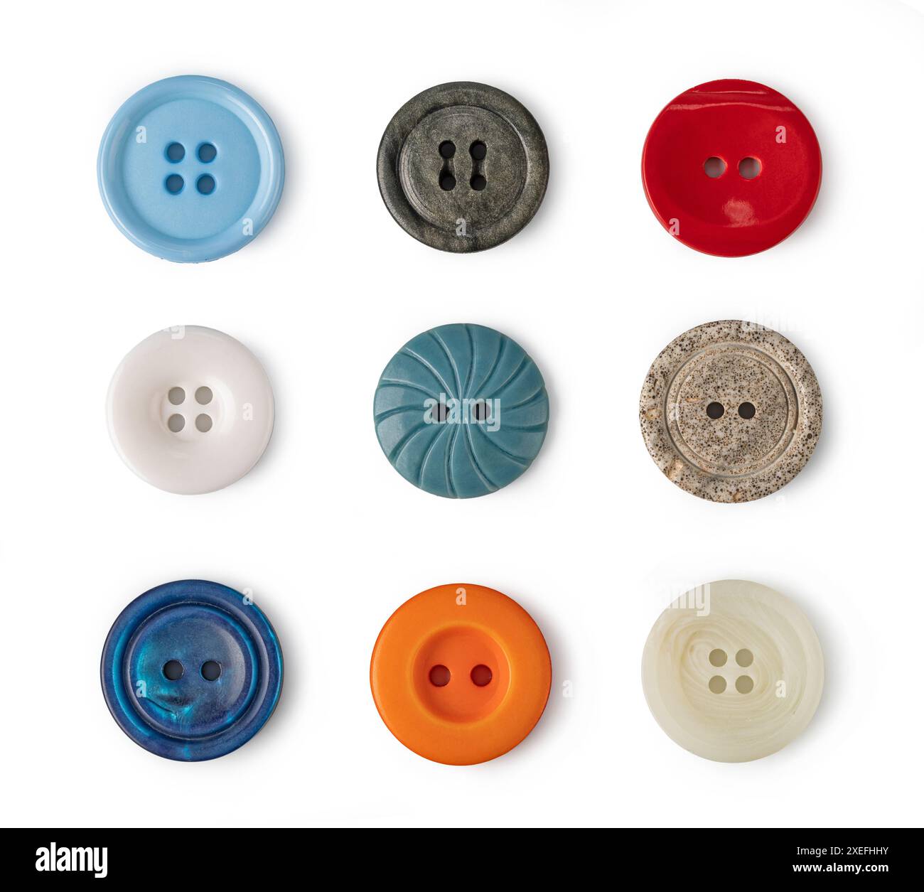 Sewing buttons with a thread Stock Photo - Alamy