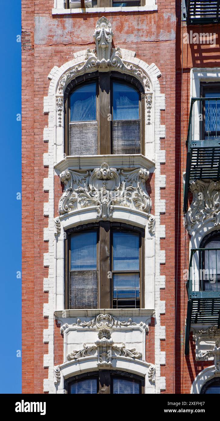 NYC Chinatown: Fake white paint quoins decorate the corner and double ...