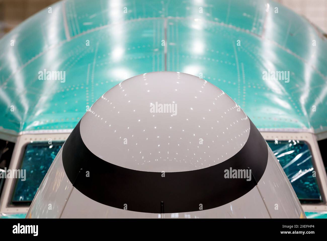 A Boeing 737 MAX aircraft is shown on the assembly line during a brief ...
