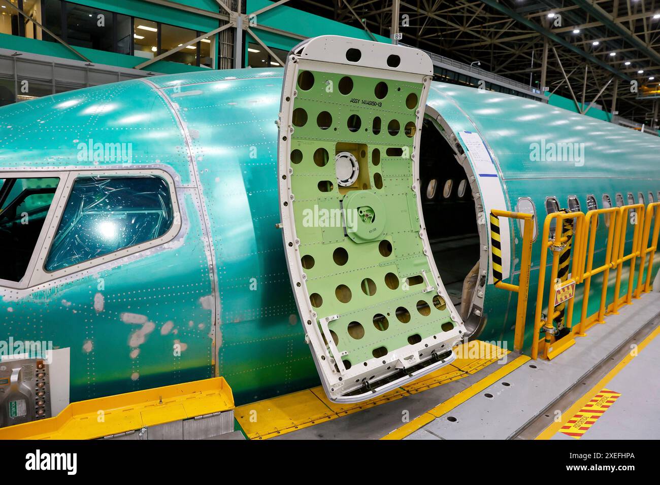 A Boeing 737 MAX aircraft is shown on the assembly line during a brief ...