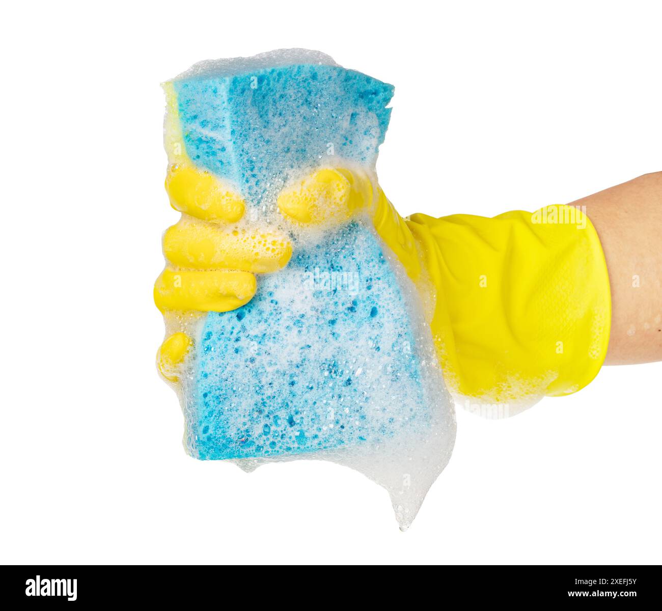Hand holding cleaning sponge Stock Photo - Alamy