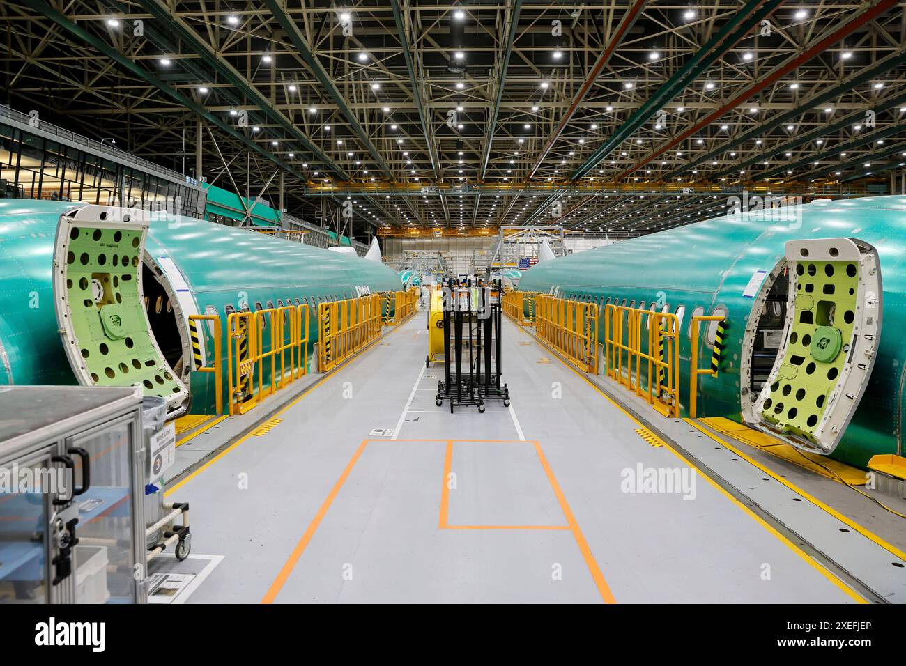 A Boeing 737 MAX aircraft is shown on the assembly line during a brief ...